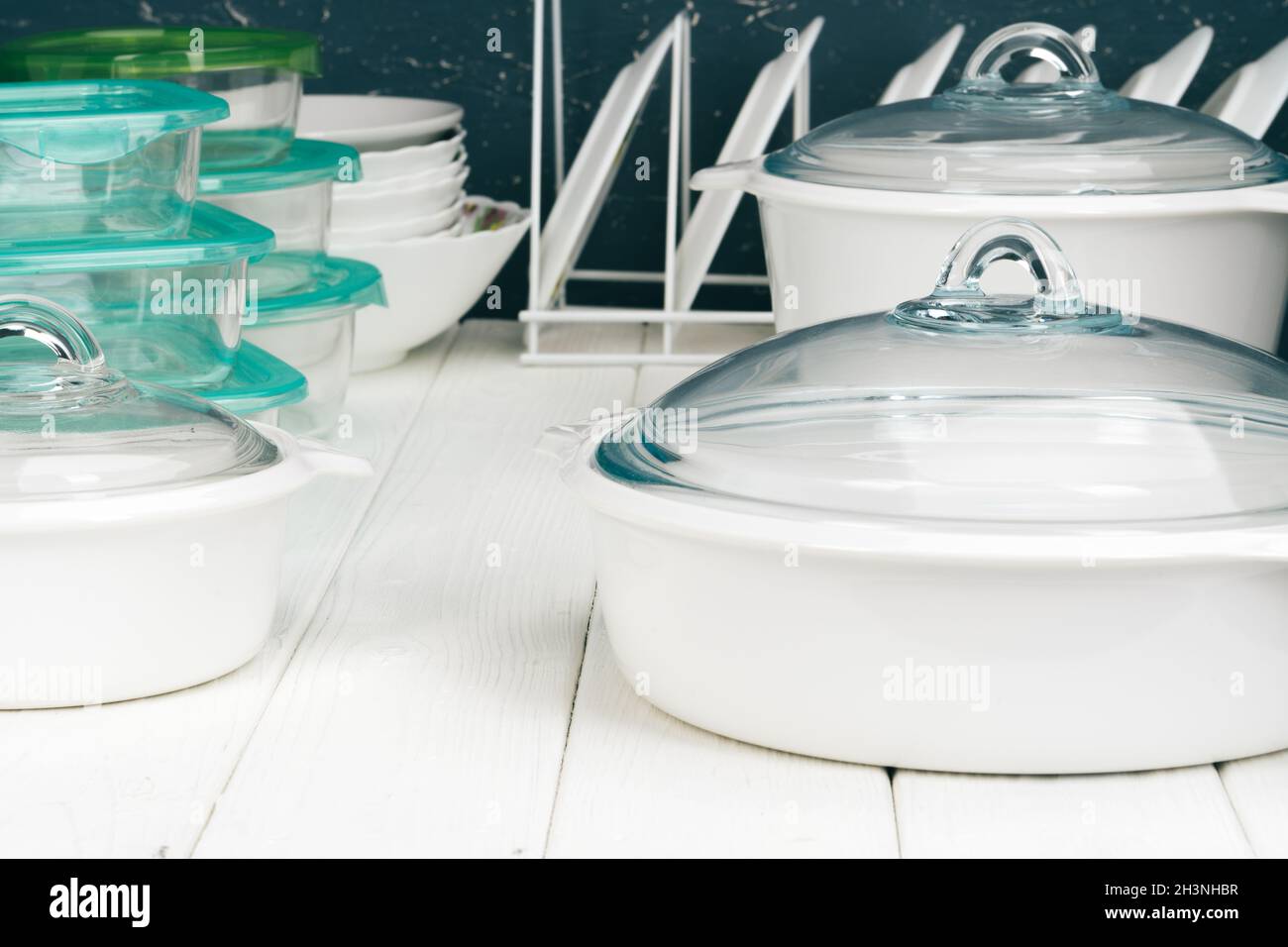 White pot cookware in a kitchen interior Stock Photo - Alamy