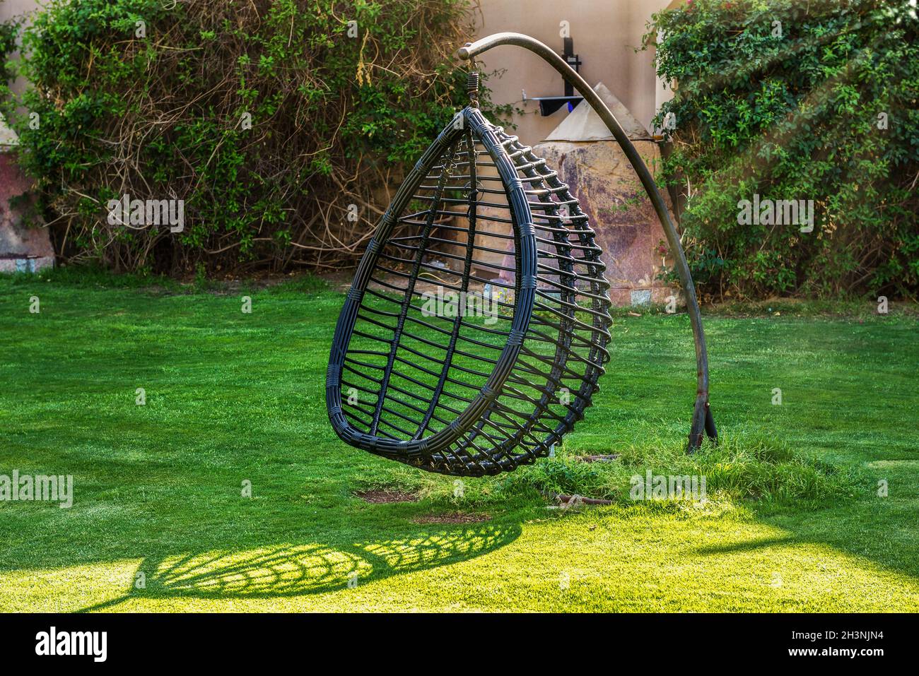 Hanging swing chair hi-res stock photography and images - Alamy