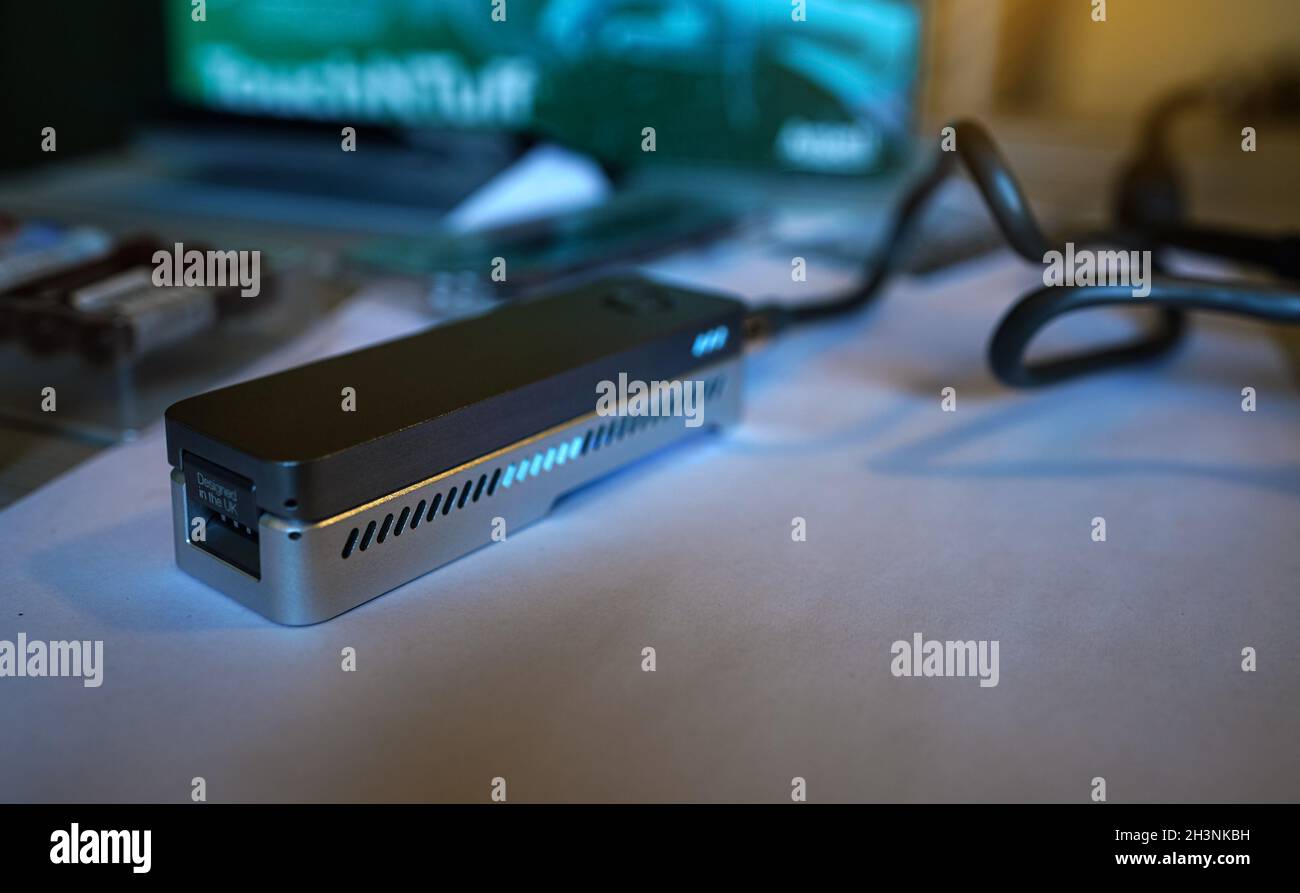 Small portable DNA flow cell sequencer, closeup shallow depth of field ...