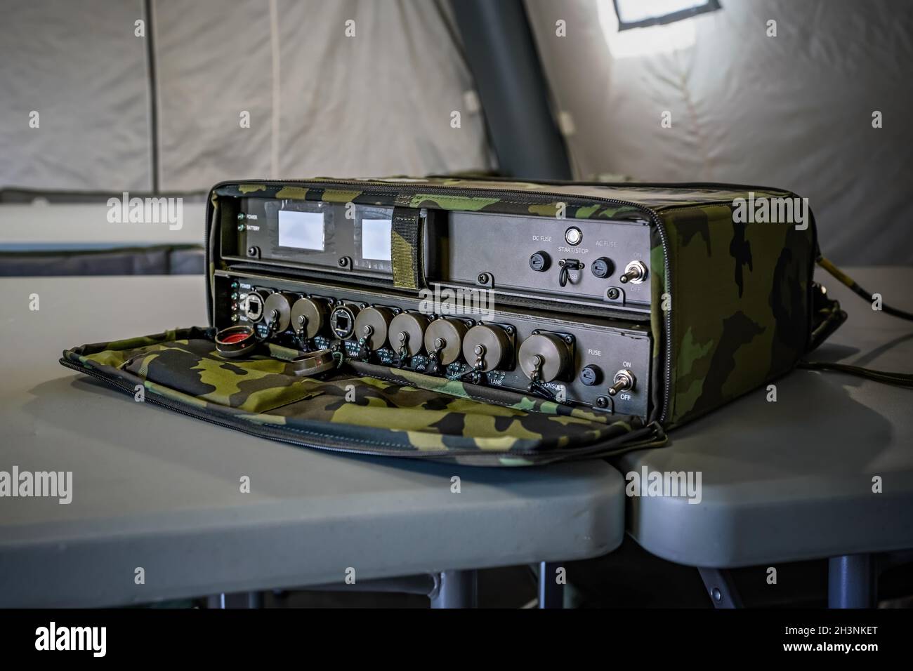 Military grade ruggedized ethernet network switch on a desk in army ...