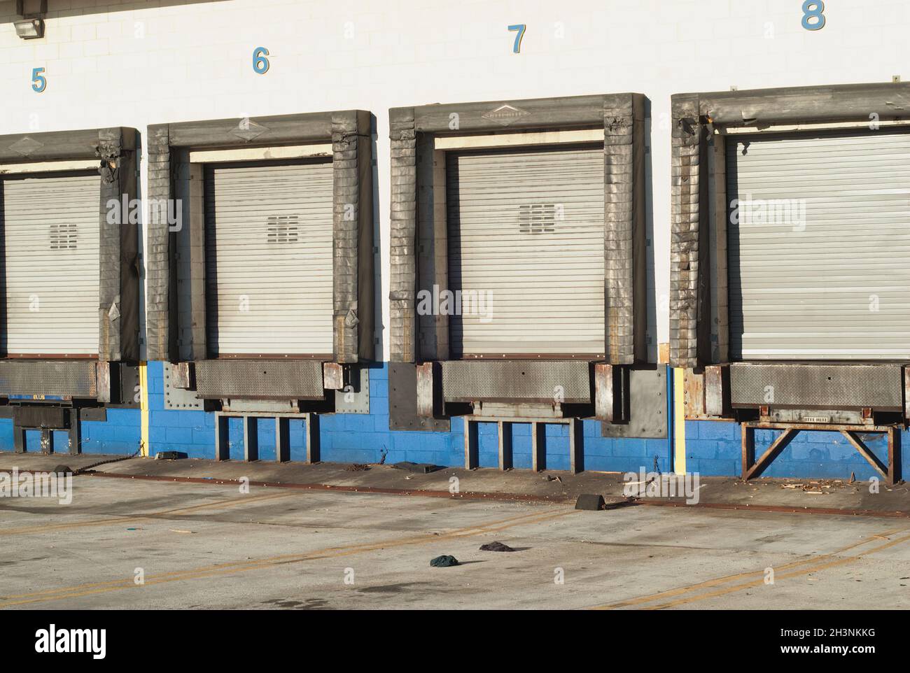Loading docks at the back end of a building Stock Photo - Alamy