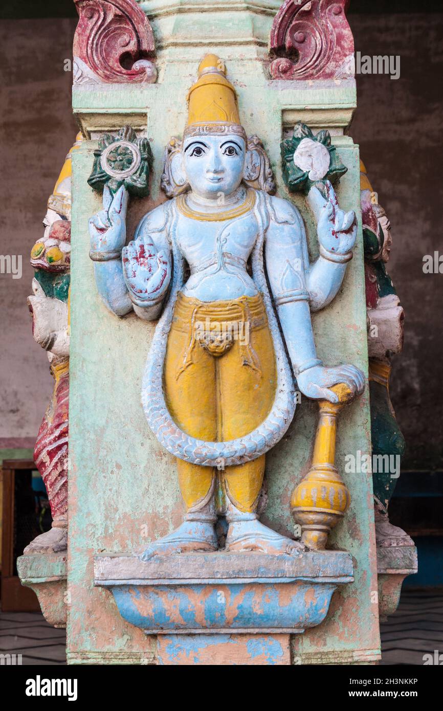 VRINDAVAN, INDIA - FEBRUARY 18, 2017: Colorful carved deity on a temple ...