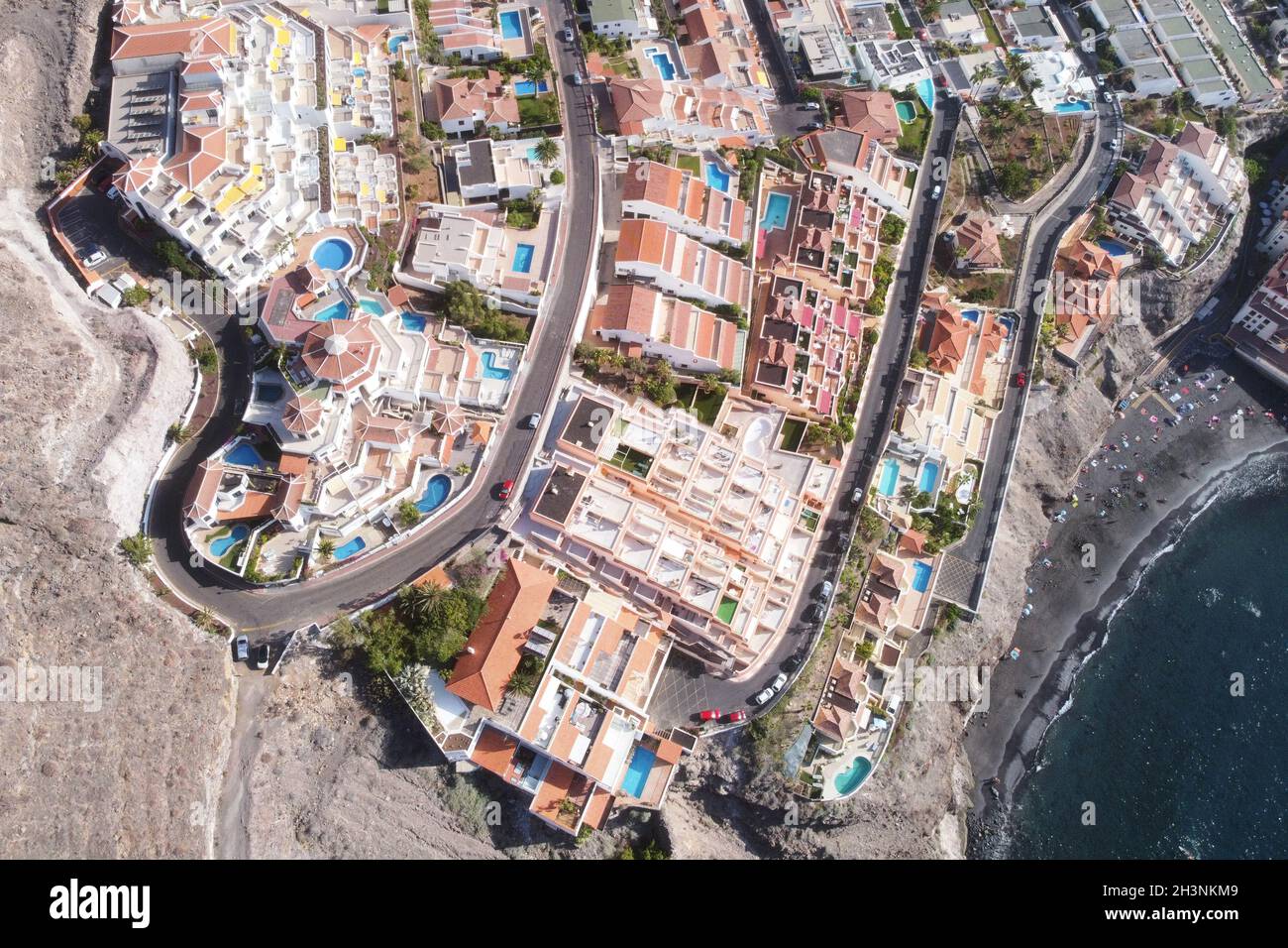 Overhead aerial directly above view of of Los Gigantes resort and ...