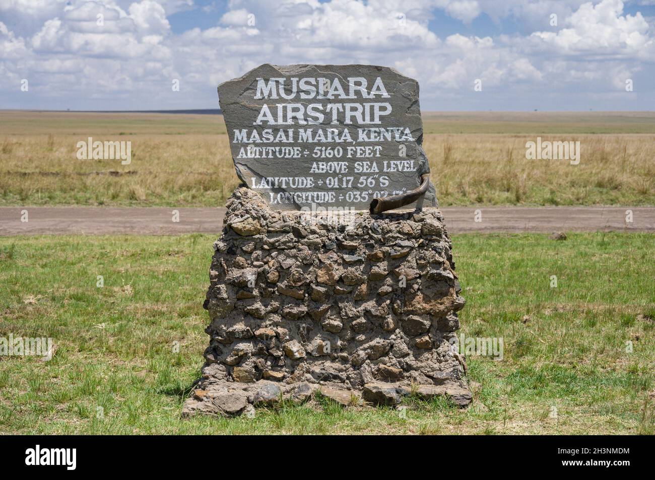 Musiara airstrip stone sign with details of location and altitude ...