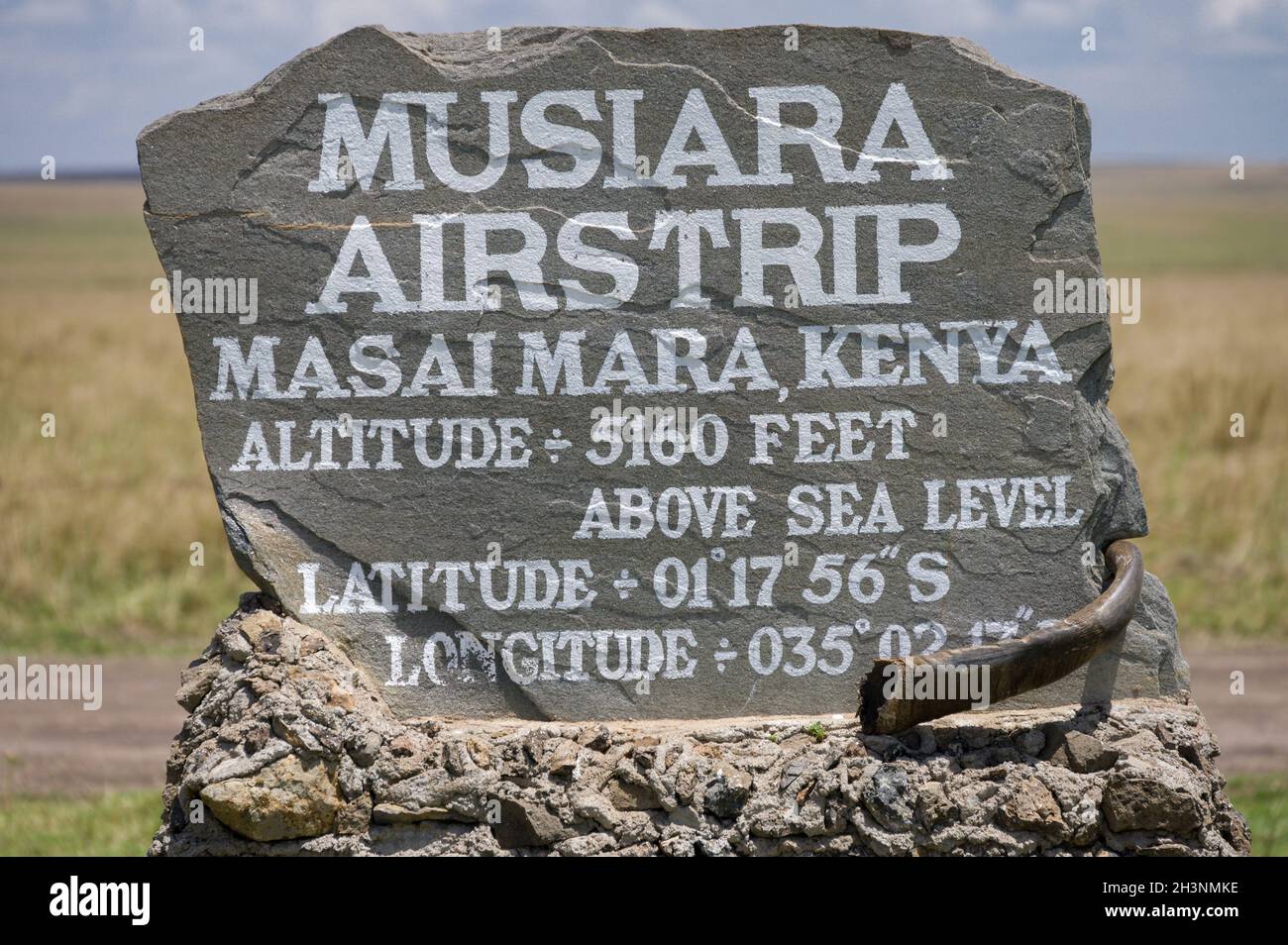 Musiara airstrip stone sign with details of location and altitude ...