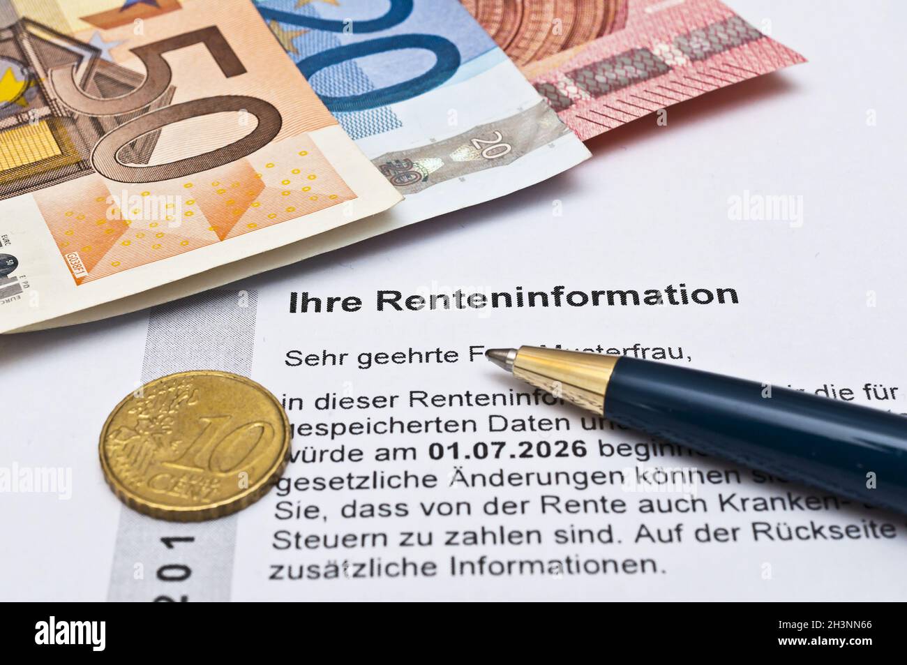 Retirement pay and some money Stock Photo - Alamy