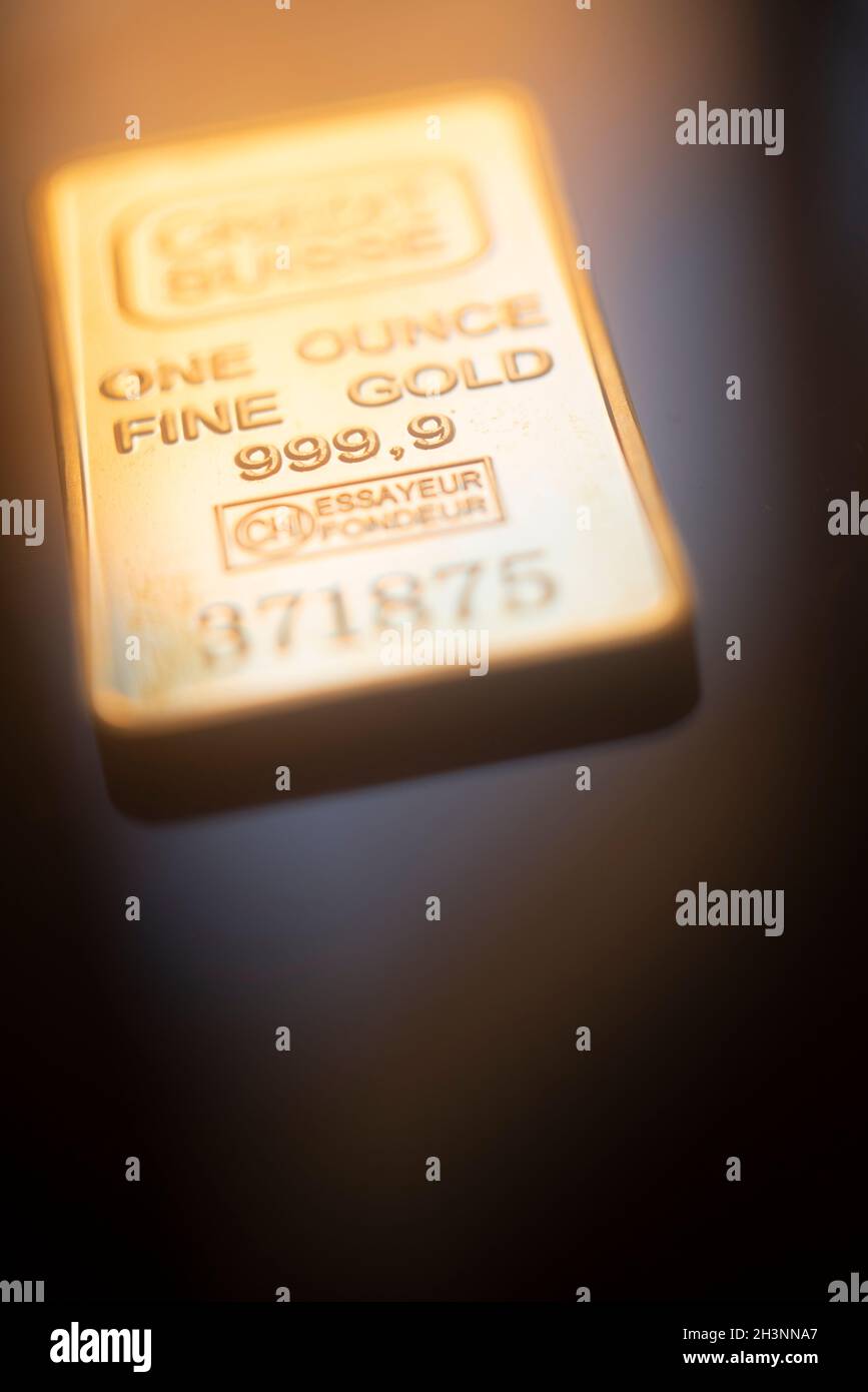 Solid pure 999.9 gold bullion ingot bars photo Stock Photo - Alamy