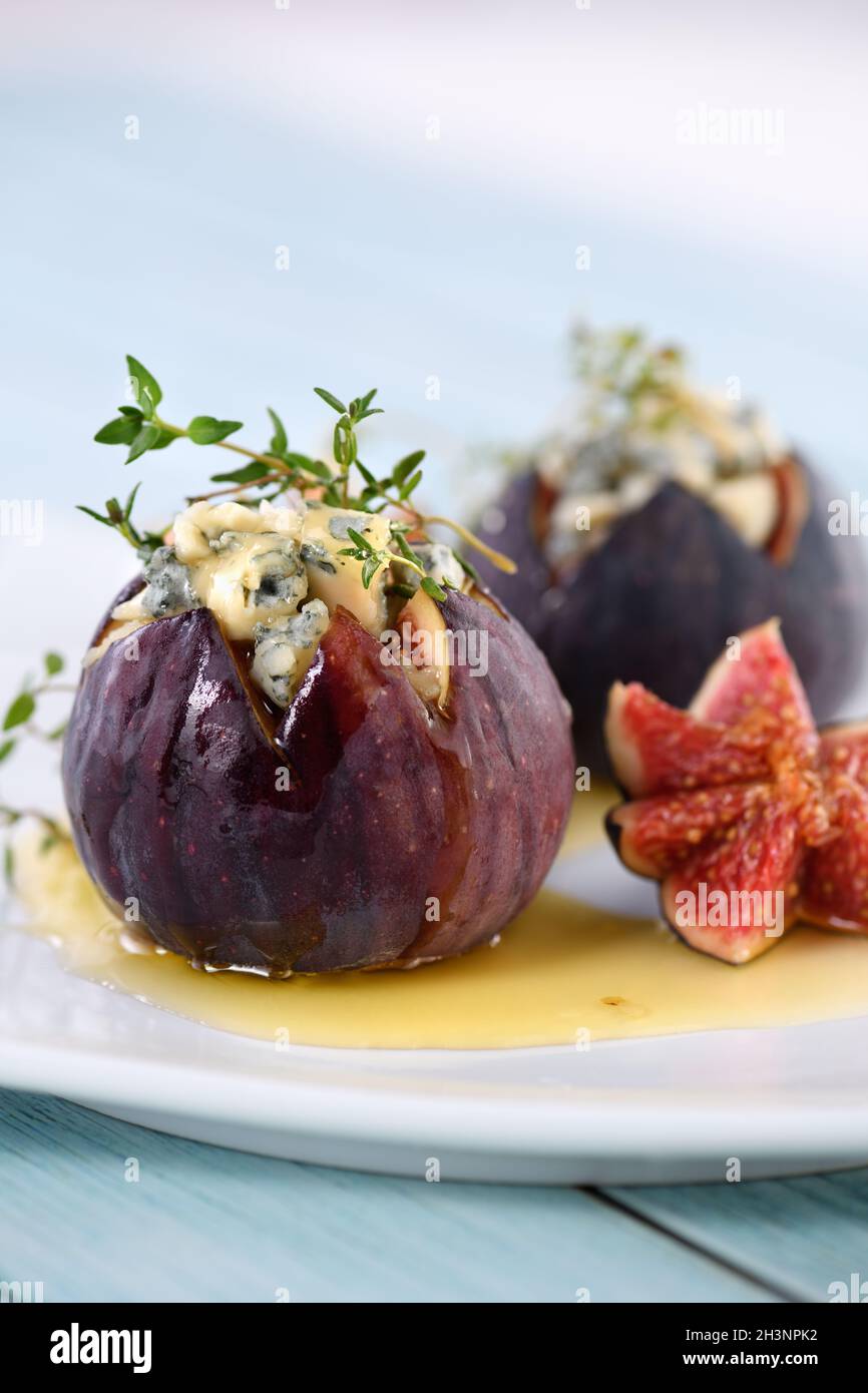 Figs stuffed with blue cheese and thyme, seasoned with honey Stock ...