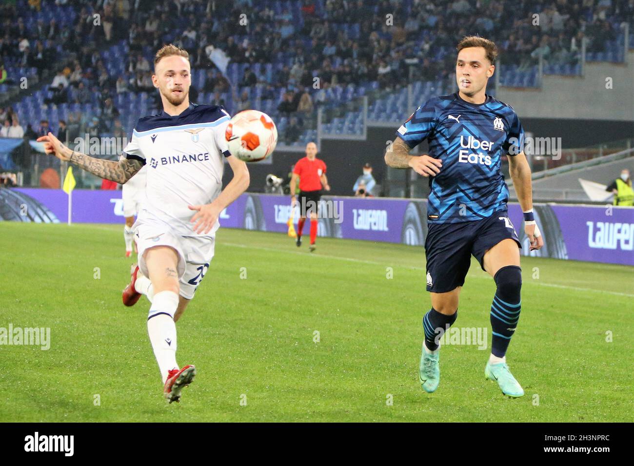 Arkadiusz Milik of Olympique Marseille and Manuel Lazzari of Lazio Rome during the UEFA Europa ...