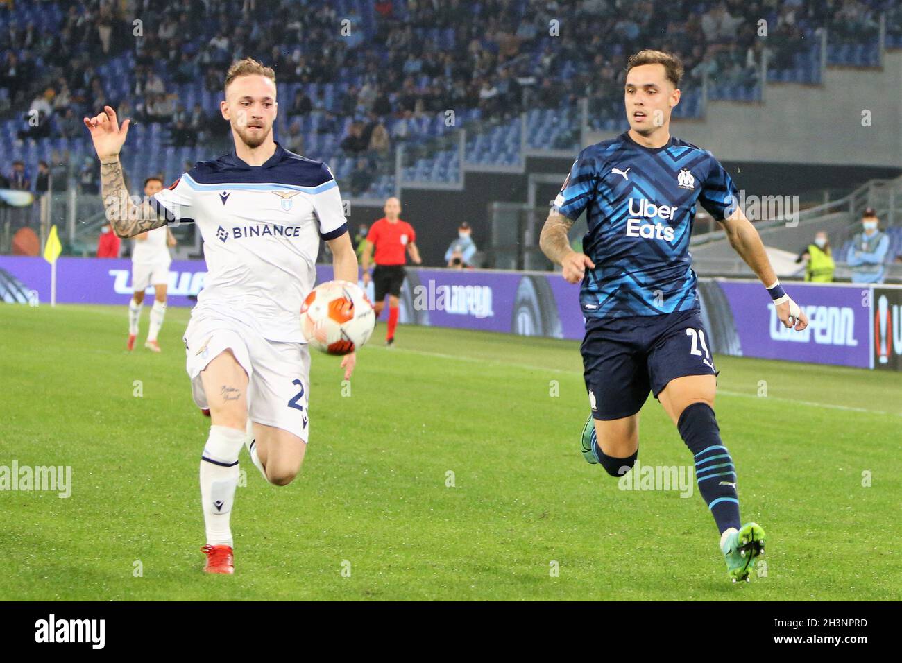 Arkadiusz Milik of Olympique Marseille and Manuel Lazzari of Lazio Rome during the UEFA Europa ...