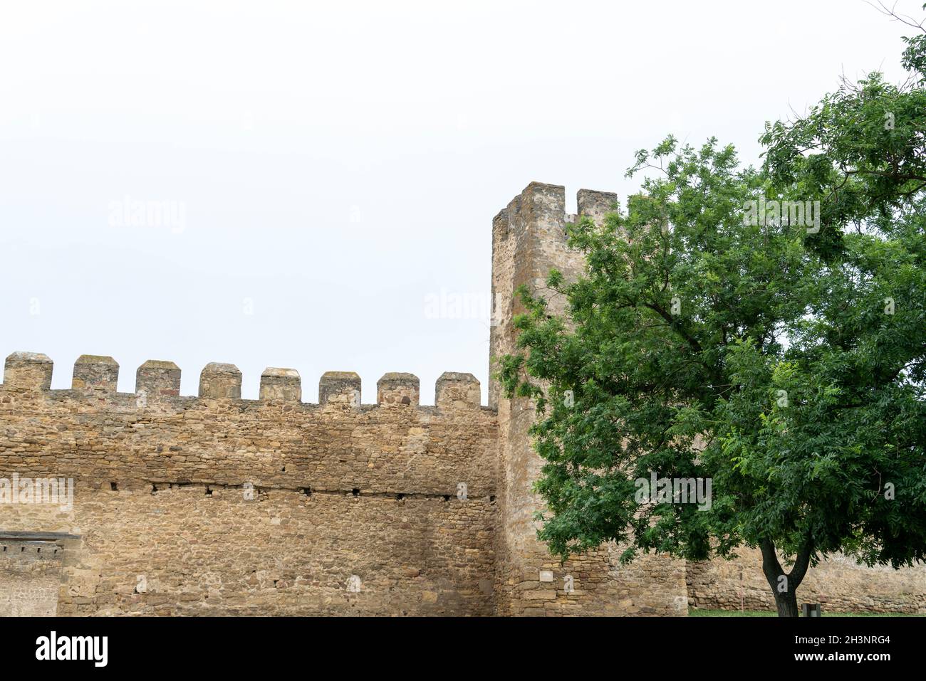An ancient fortress on the shore of the bay. Majestic stone walls ...