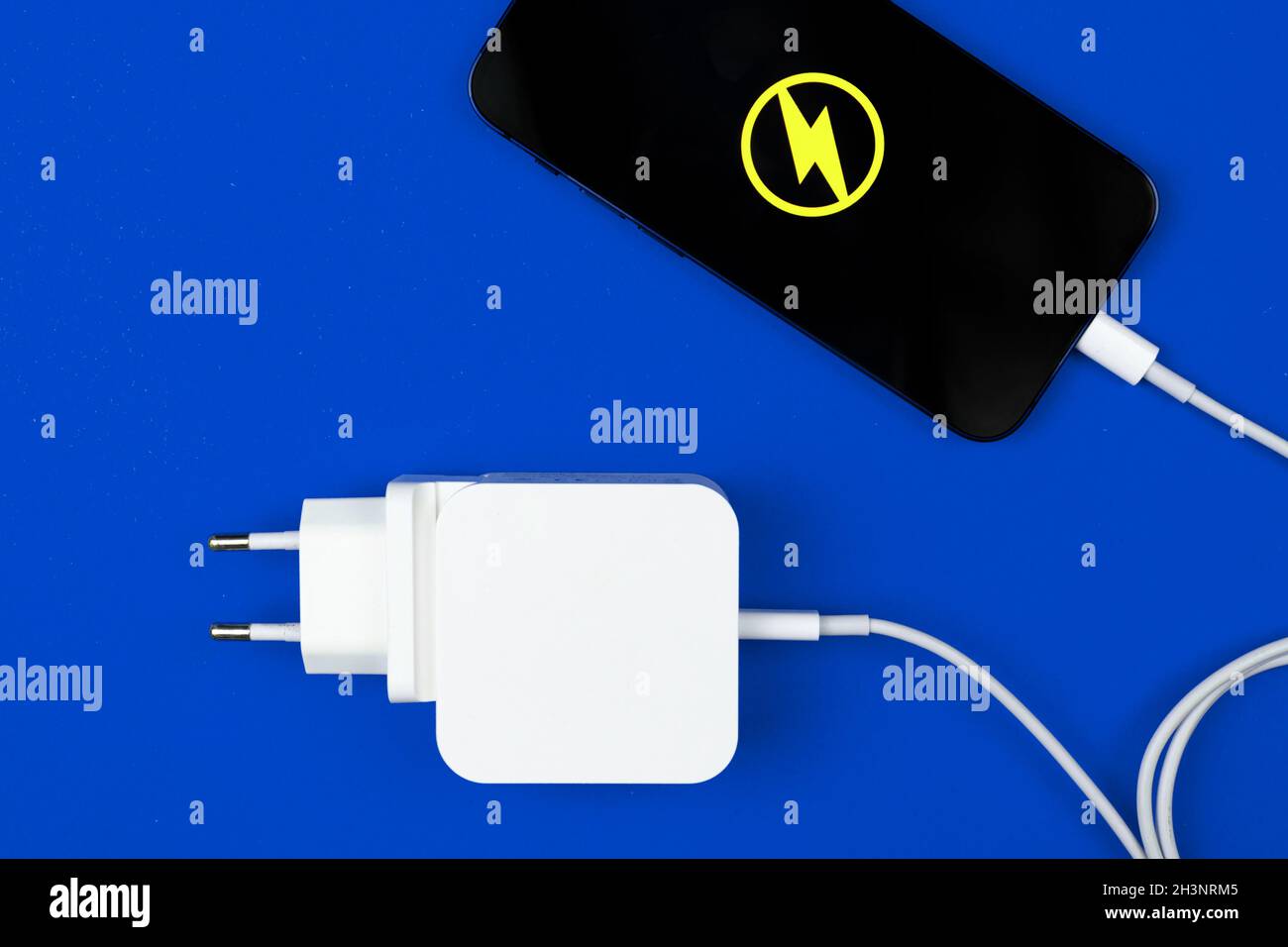 Lightning mobile charger. Smartphone with energy icon and power charger ...