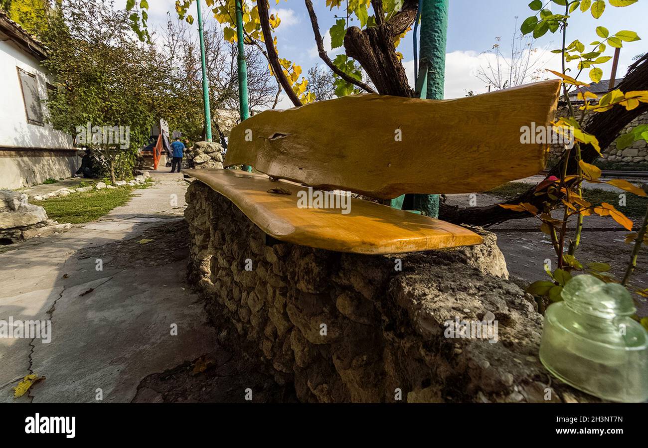 Wooden bench in the park of boards Stock Photo - Alamy