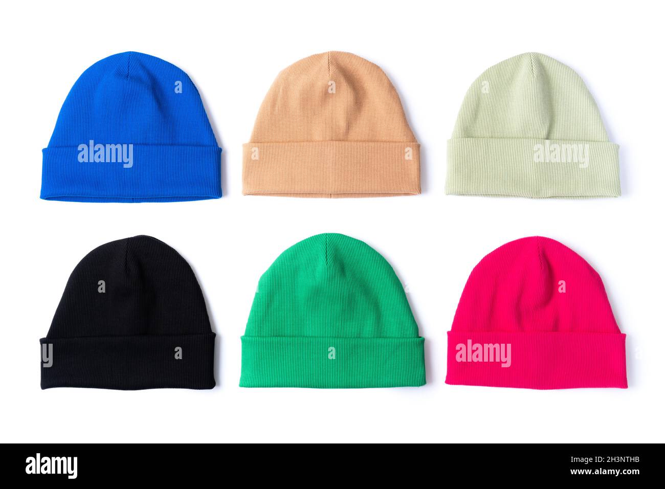 Stylish beanie hats in different bright colors are isolated on a white ...