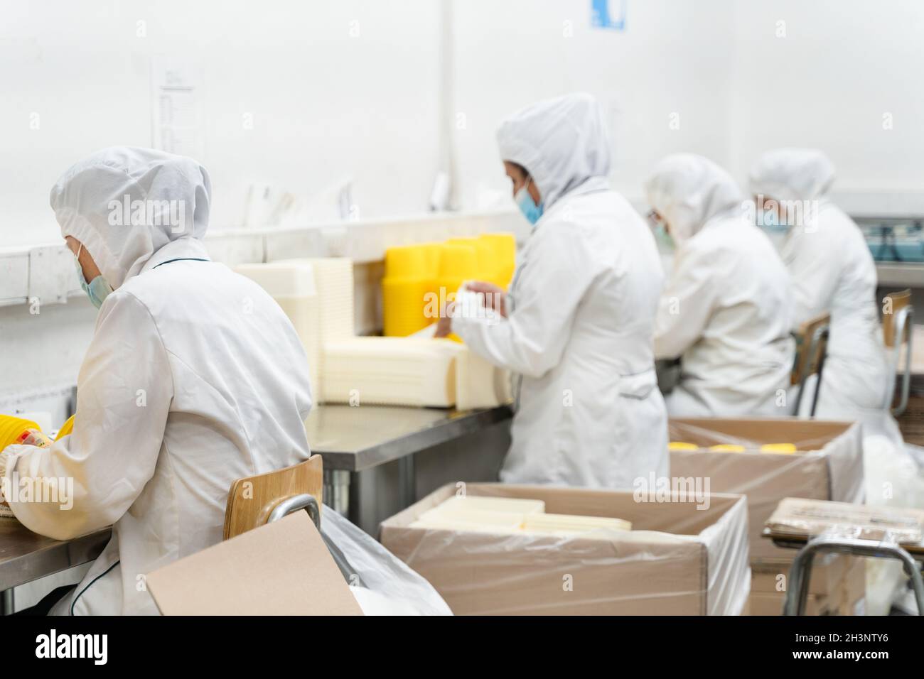 Four workers team process hi-res stock photography and images - Alamy