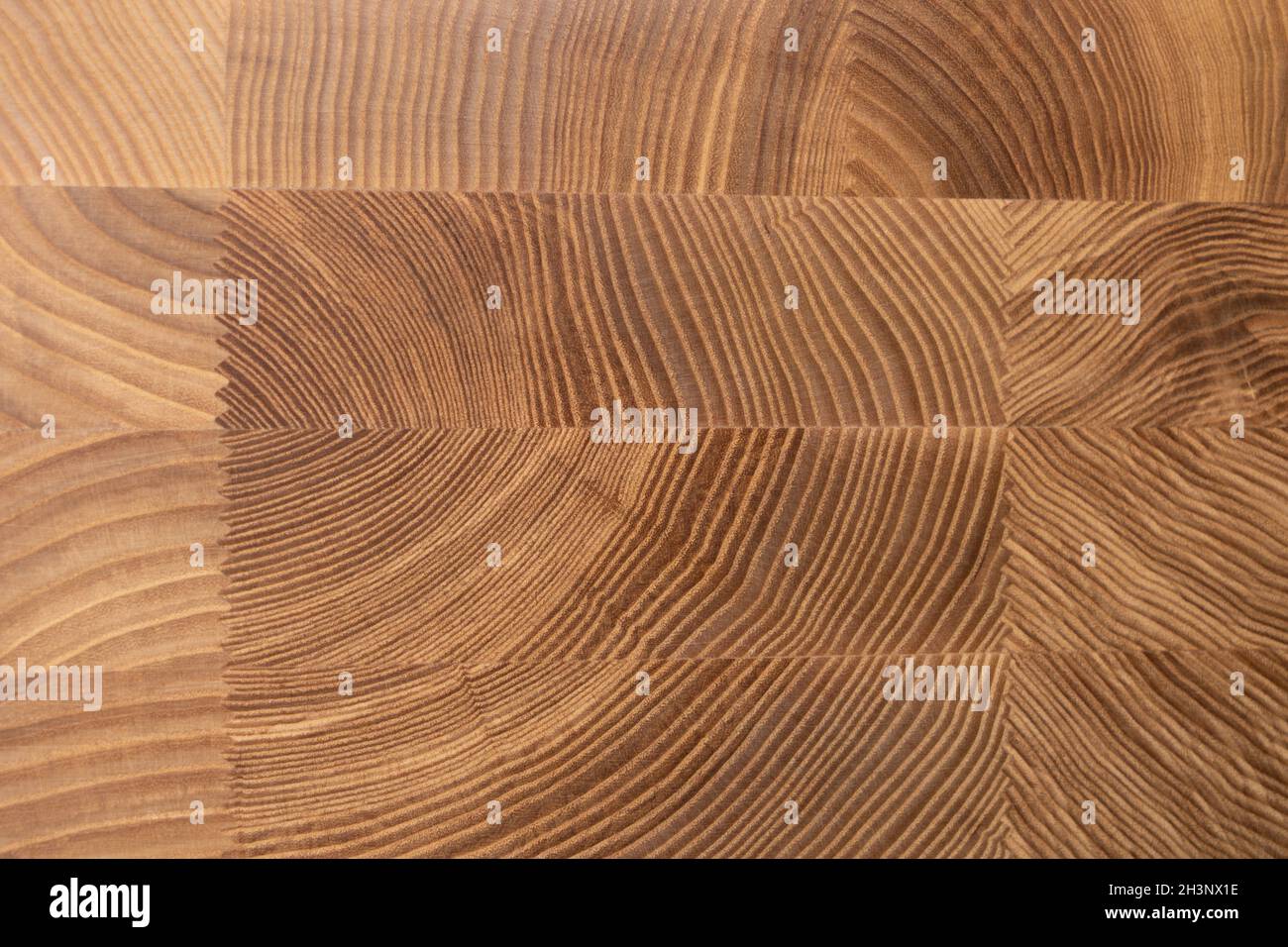 Cross section of a timber glued from separate boards. Pronounced annual ...