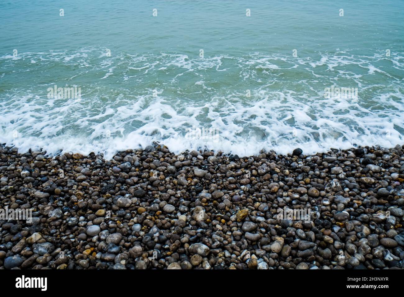 Beach with pebbles in Normandy, France Stock Photo - Alamy