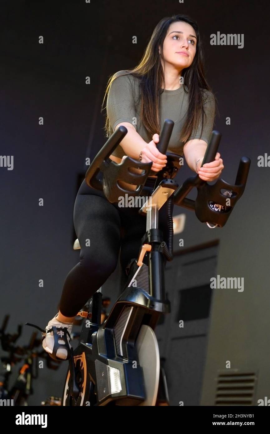 Girl riding fitness machine in hi-res stock photography and images - Alamy