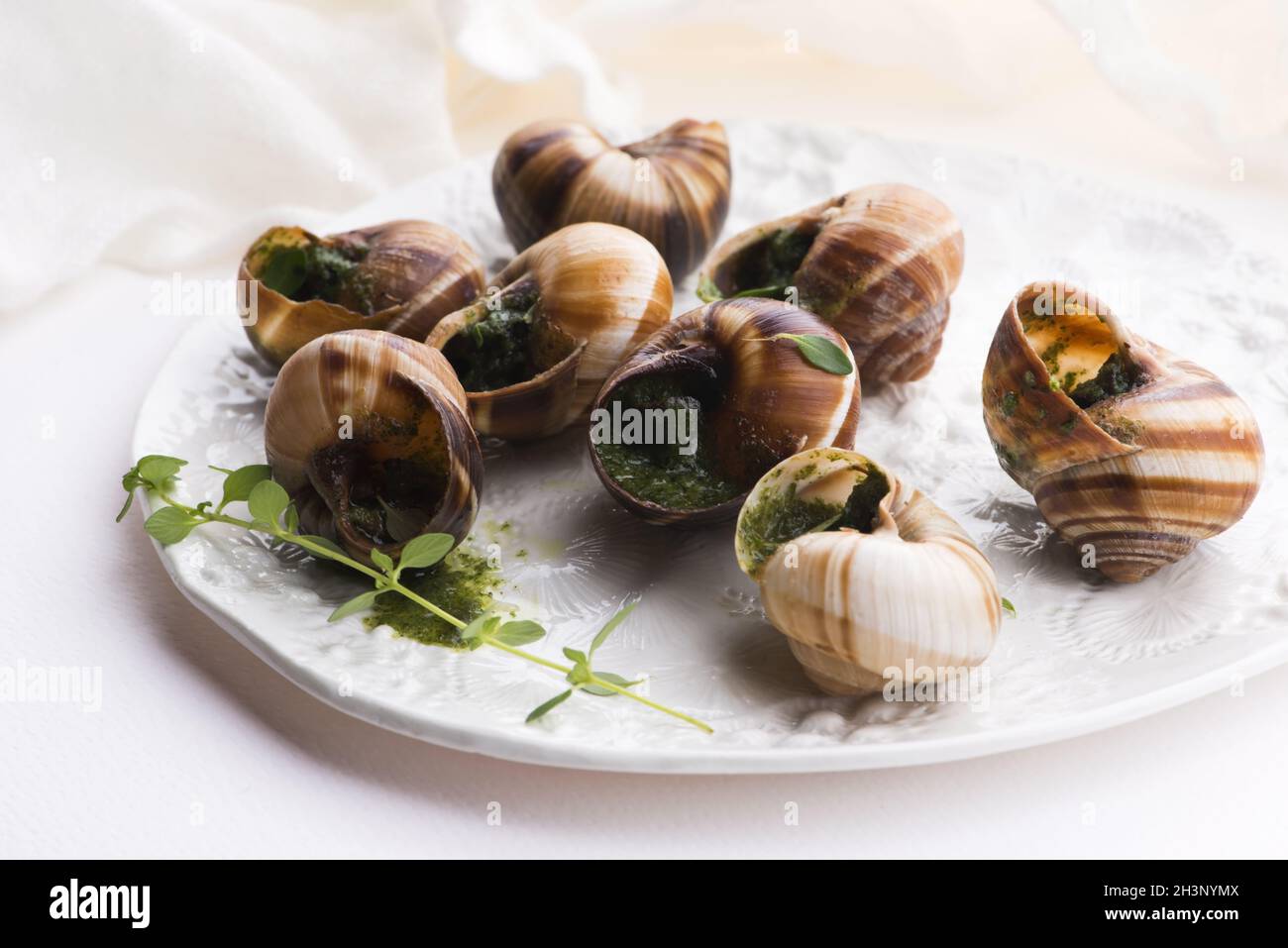 Escargot platter, delicious french delicatessen Stock Photo - Alamy