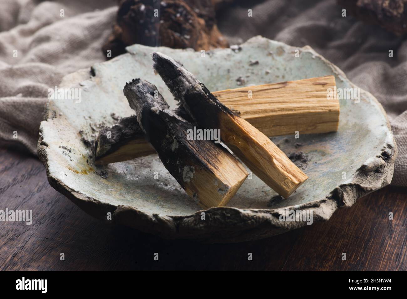 Smudging ceremony using Peruvian Palo Santo holy wood incense stick ...
