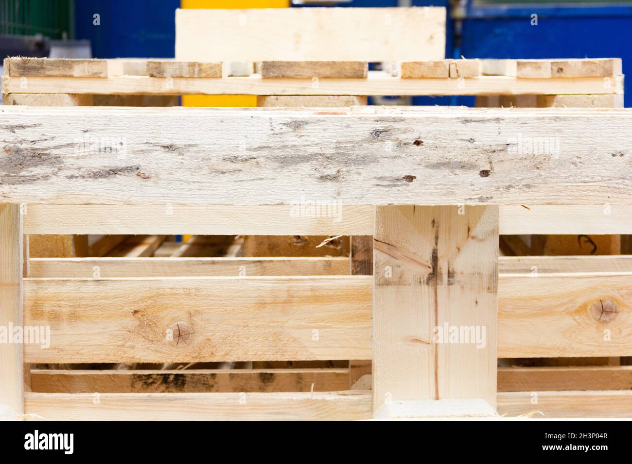 Industrial wooden pallets in factory. Logistics supply concept Stock ...
