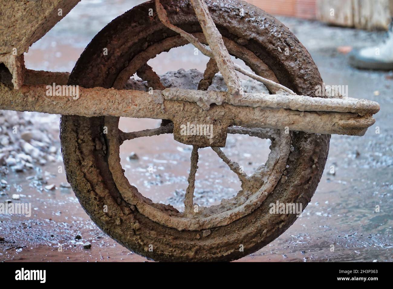 Wheel of a rusty cart in an industrial area Stock Photo - Alamy