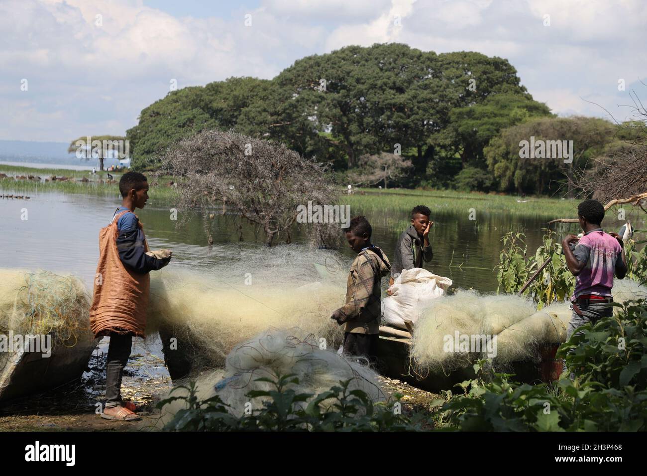 Hawassa, Ethiopia. 29th Oct, 2021. Young people prepare to fish at ...