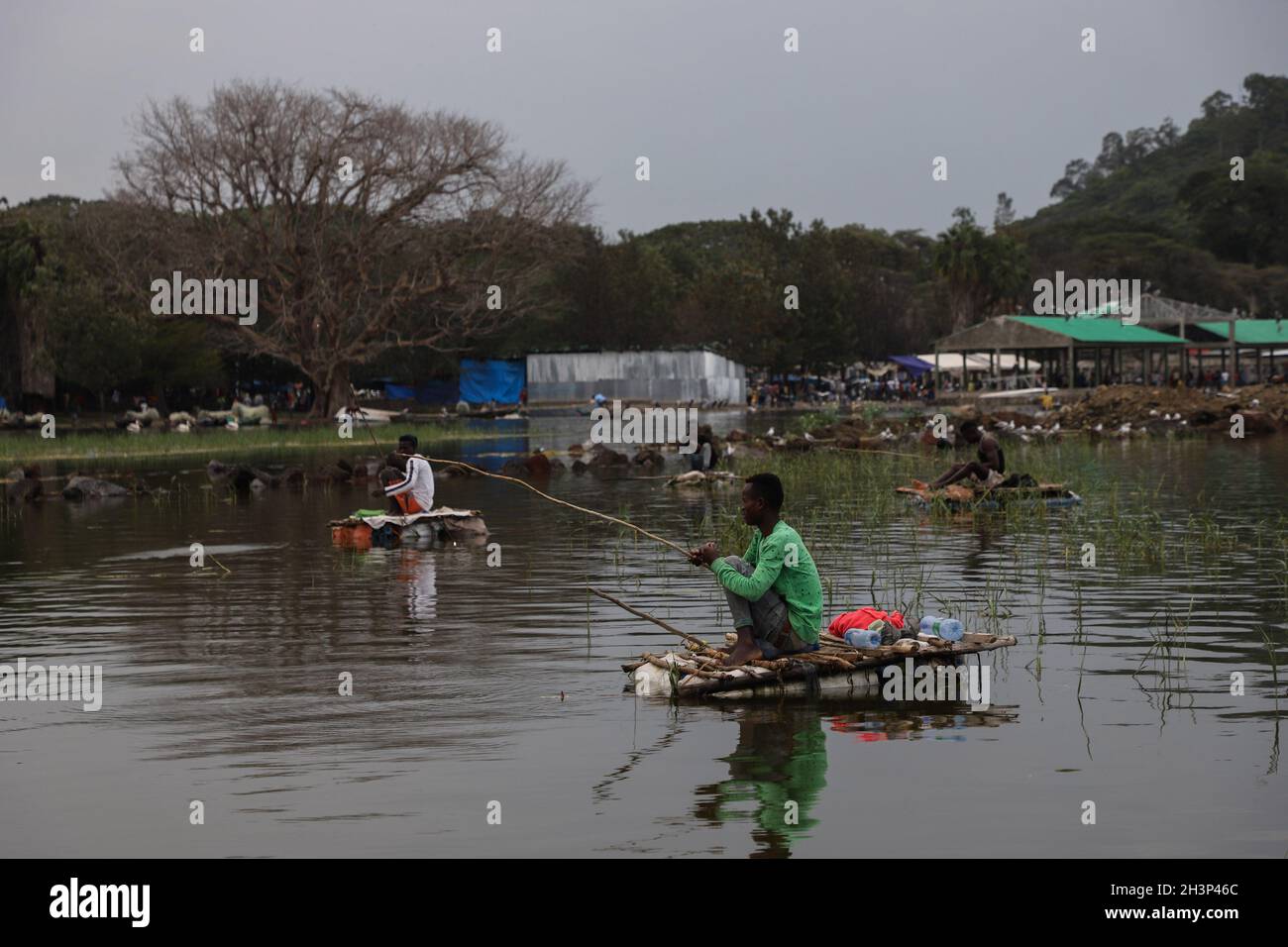 Hawassa, Ethiopia. 29th Oct, 2021. Young people fish at Hawassa Lake in ...