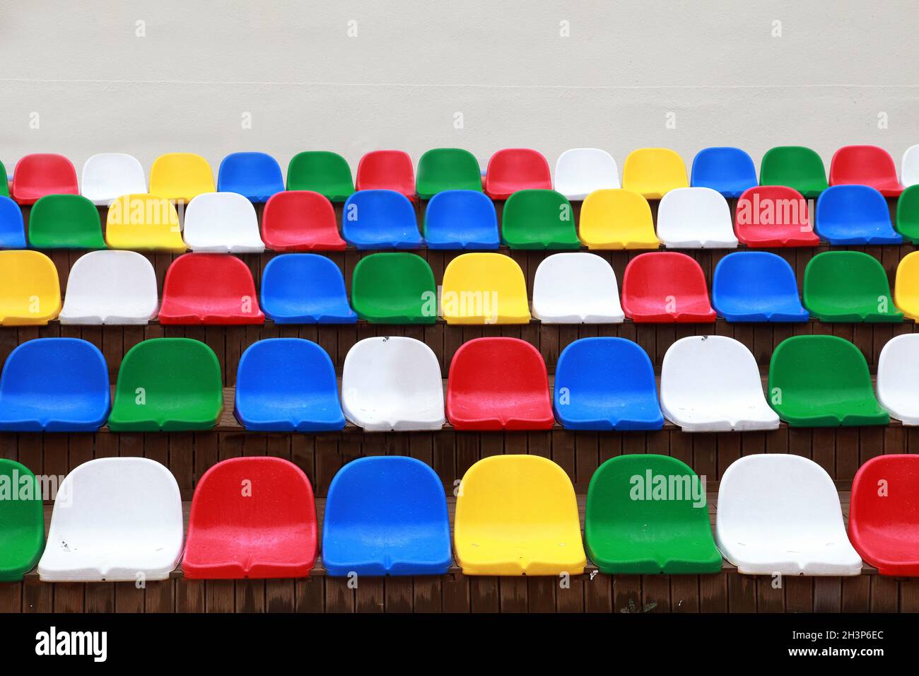 Colorful seats in the stadium Stock Photo - Alamy