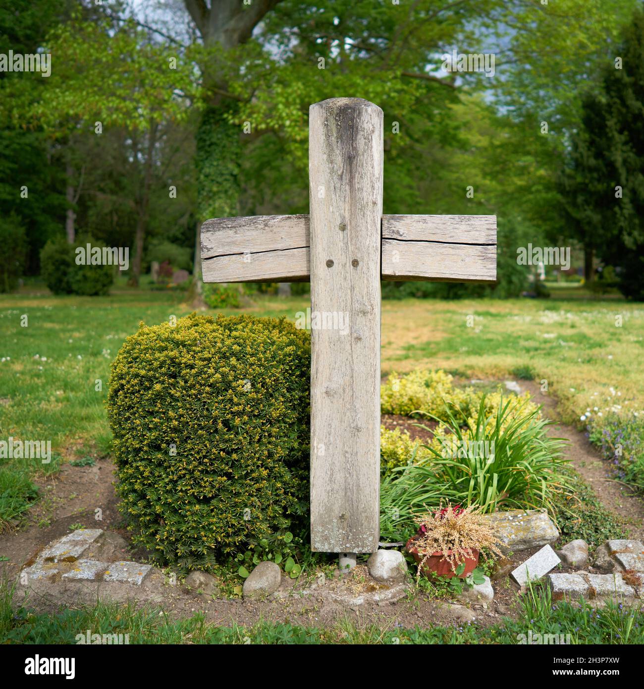 Wooden cross in cemetery hi-res stock photography and images - Alamy