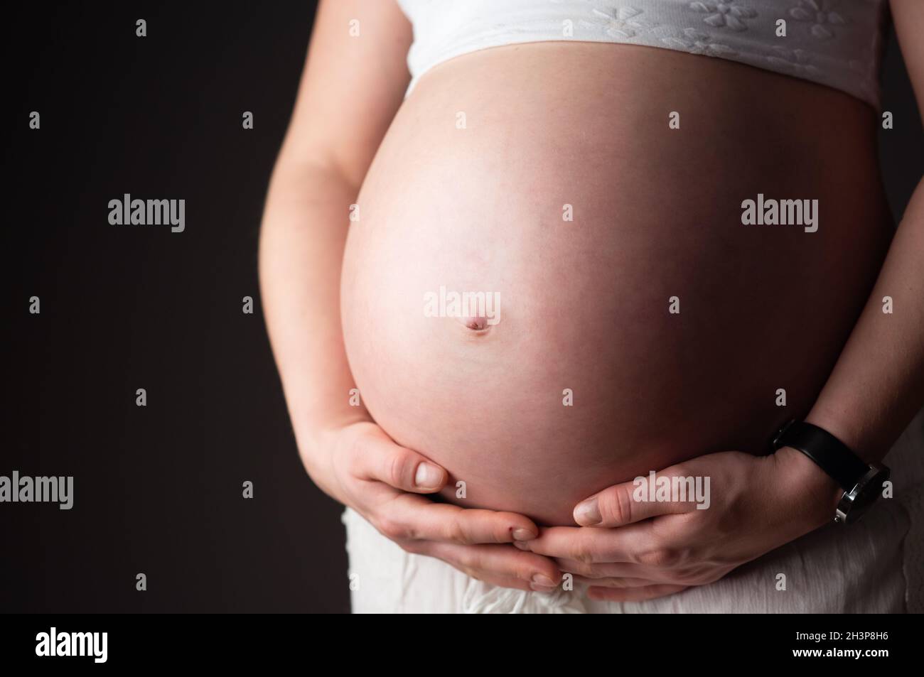 Side pregnant belly hi-res stock photography and images - Alamy