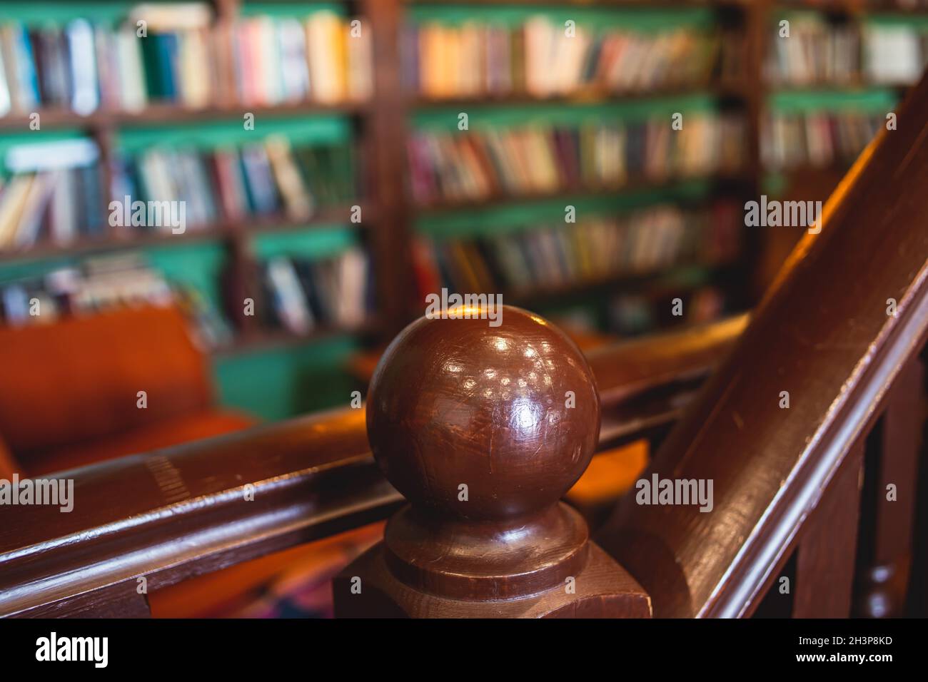 Old university college library interior with a bookshelves, books and ...