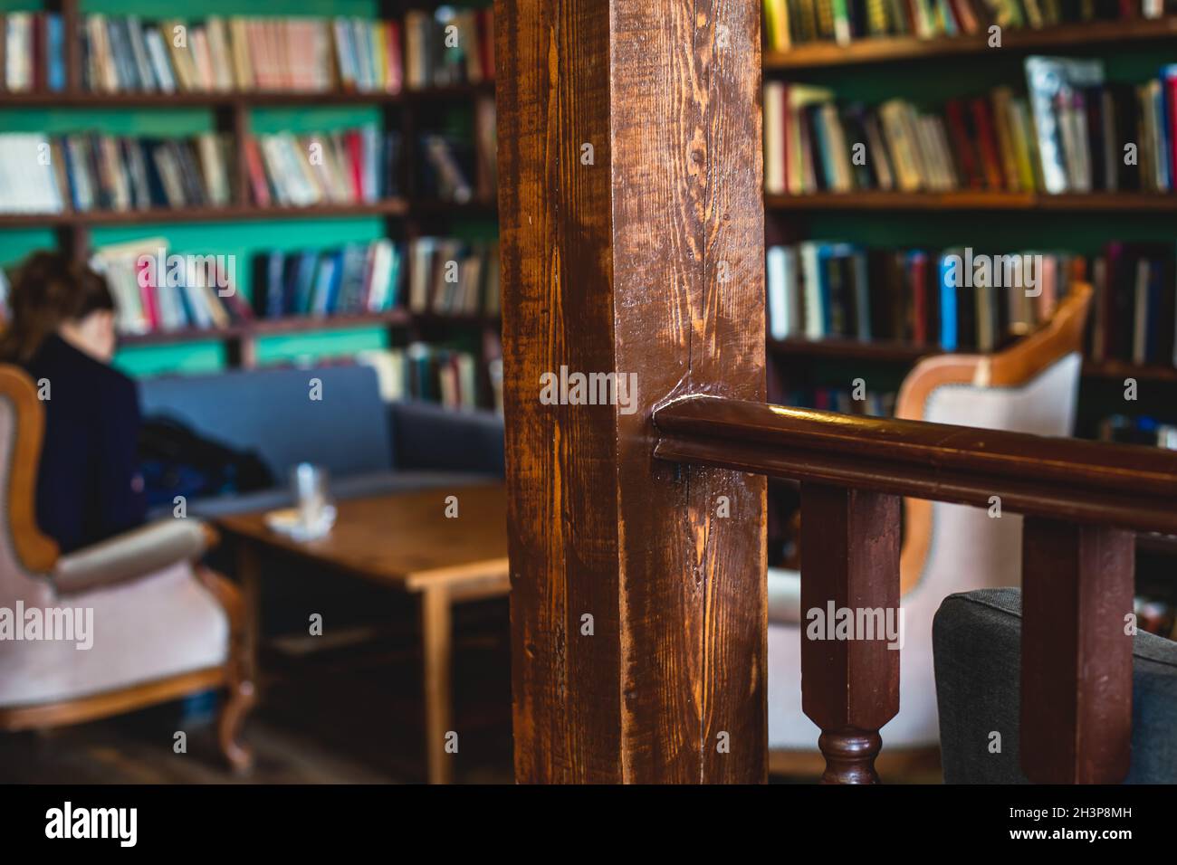 Old university college library interior with a bookshelves, books and ...