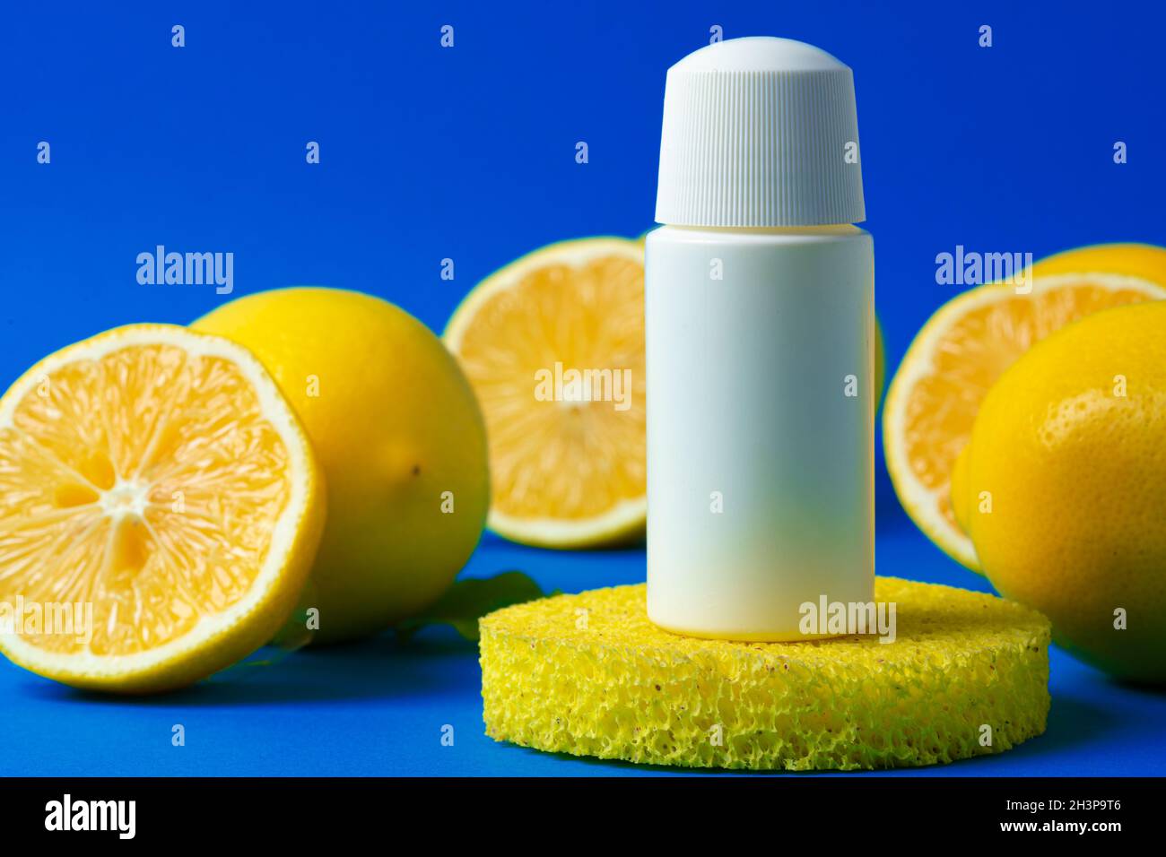 Bottle of skincare cosmetics with sliced lemons Stock Photo - Alamy
