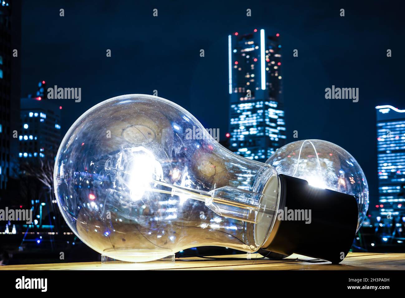 Huge light bulbs and Landmark Tower Stock Photo - Alamy