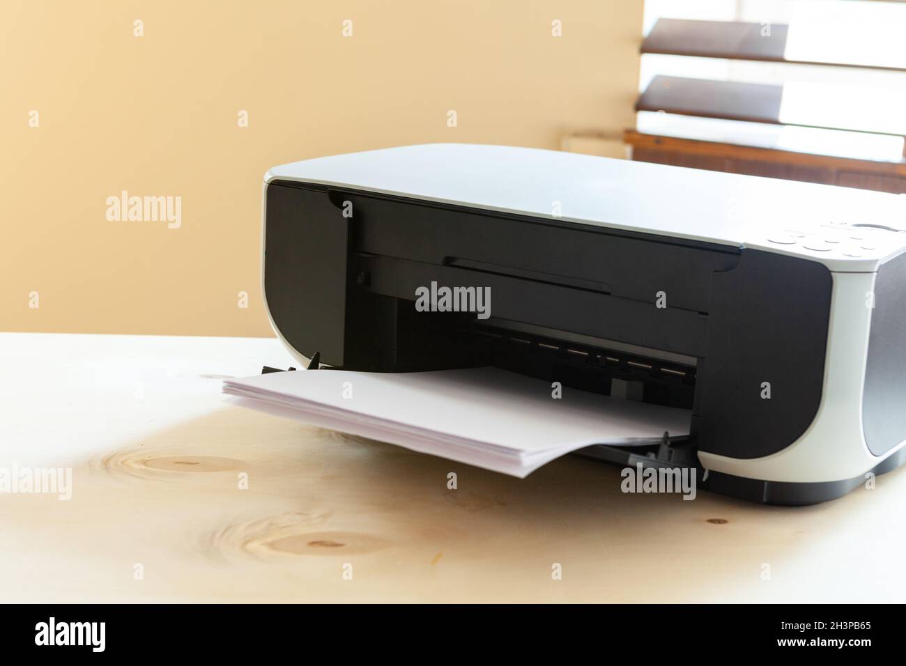 Close up of an office table with printer on it Stock Photo - Alamy