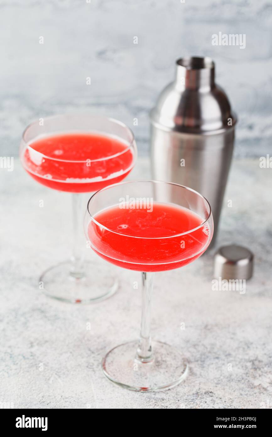 Pink Raspberry Cocktail in drink glass Stock Photo - Alamy