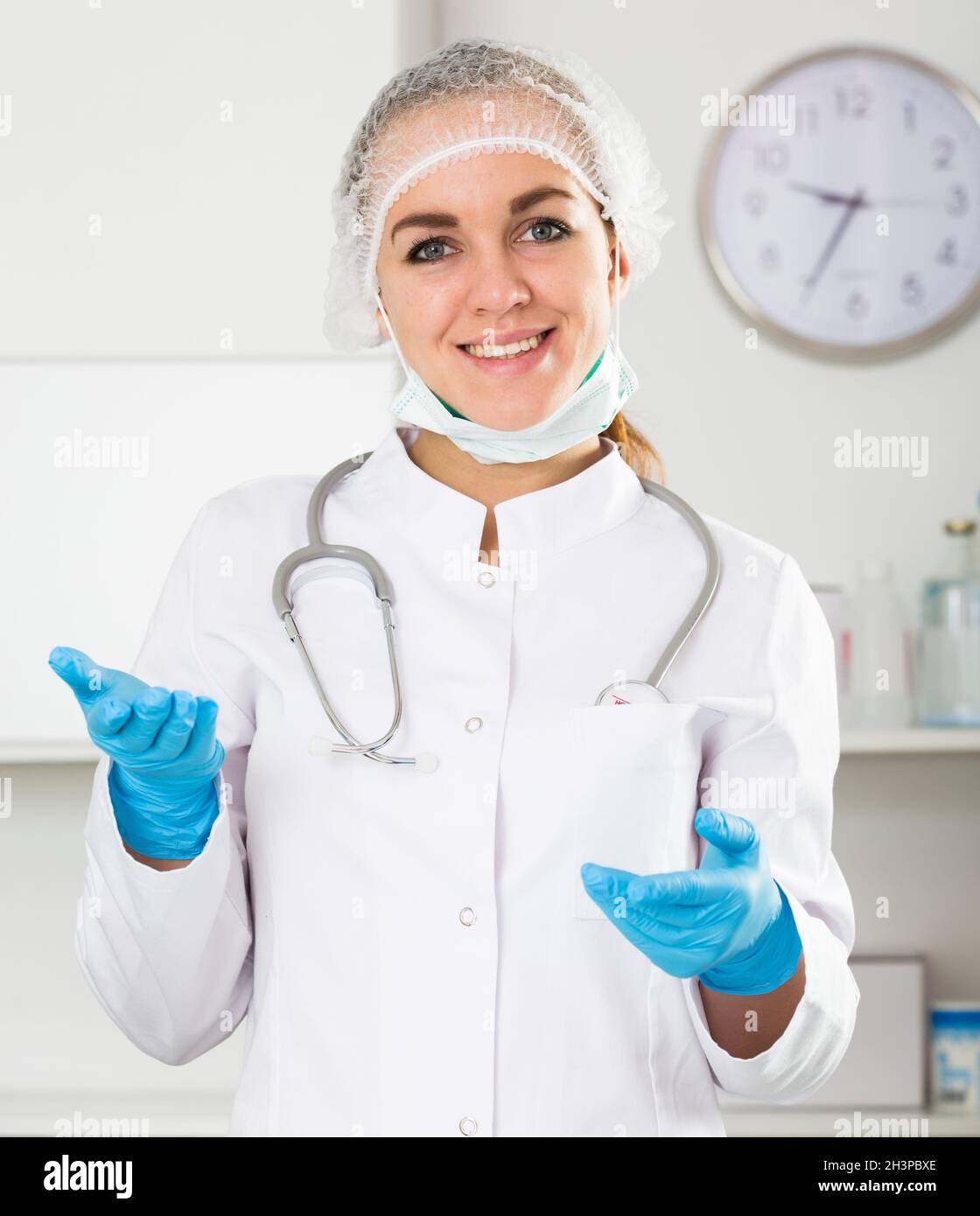Female doctor waiting for patients Stock Photo - Alamy