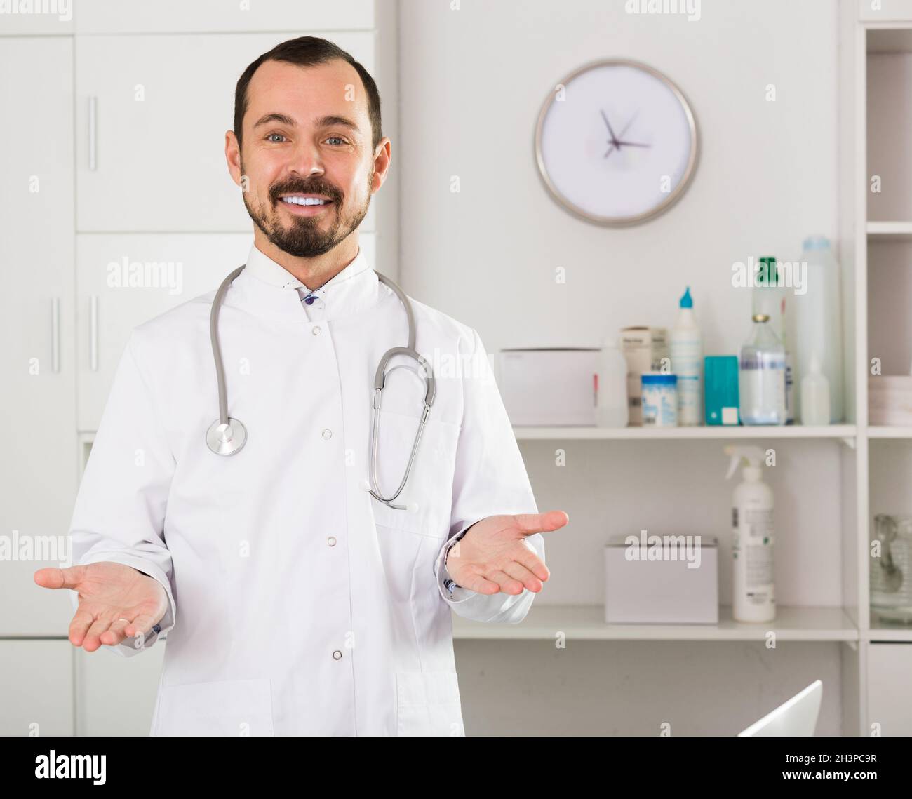 Positive young male doctor ready to receive clients Stock Photo - Alamy