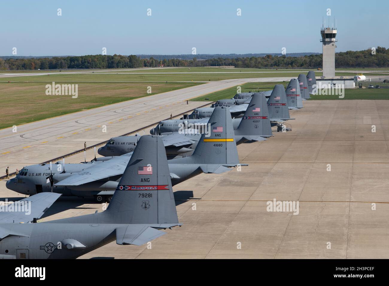 The 179th Airlift Wing prepares to conduct a five ship formation flight ...