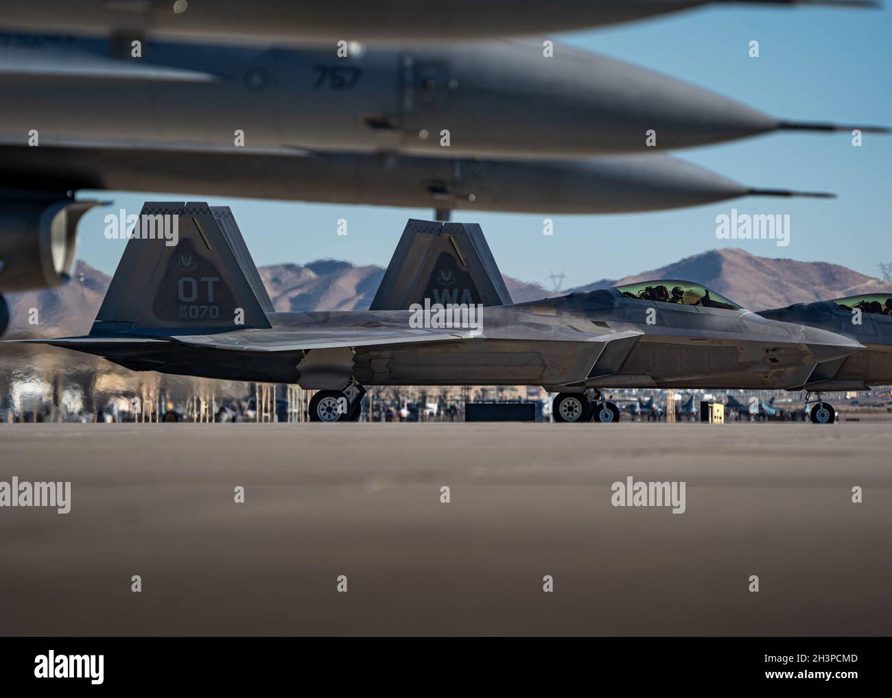 An F-22 Raptor assigned to the 422nd Test and Evaluation Squadron taxis ...