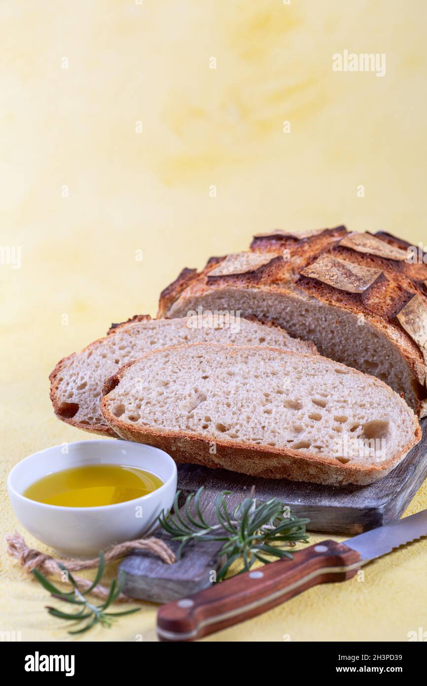 Freshly baked artisanal bread and olive oil Stock Photo - Alamy