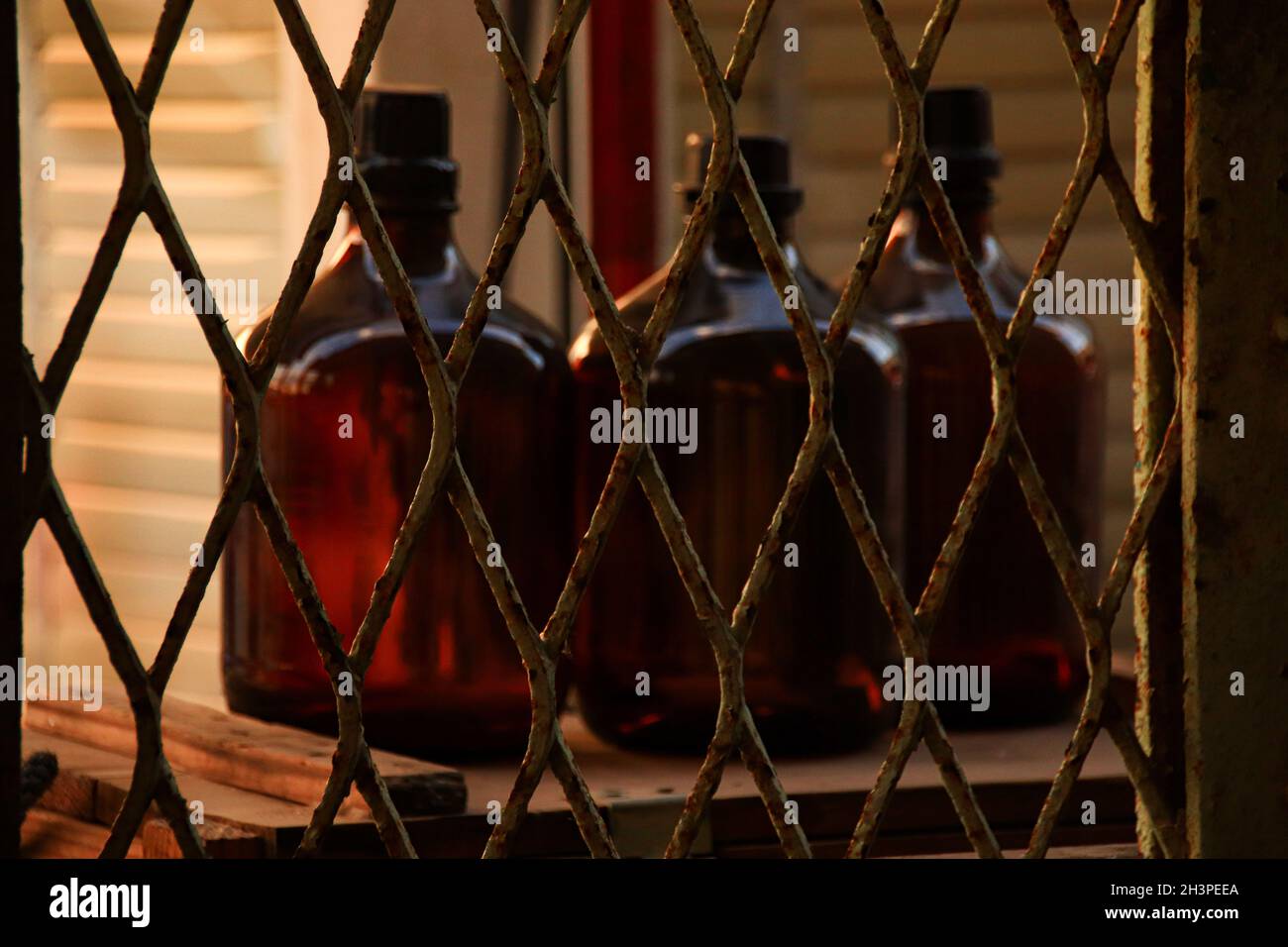 Vintage glass bottles on a window sill Stock Photo - Alamy