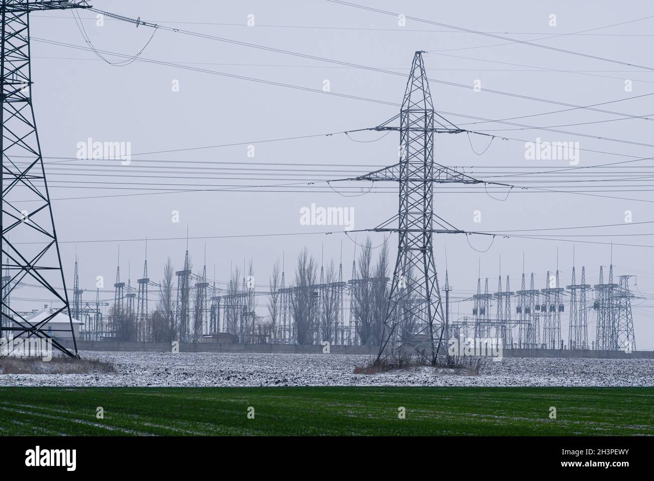 Power lines in a large number. High-voltage power lines Stock Photo - Alamy