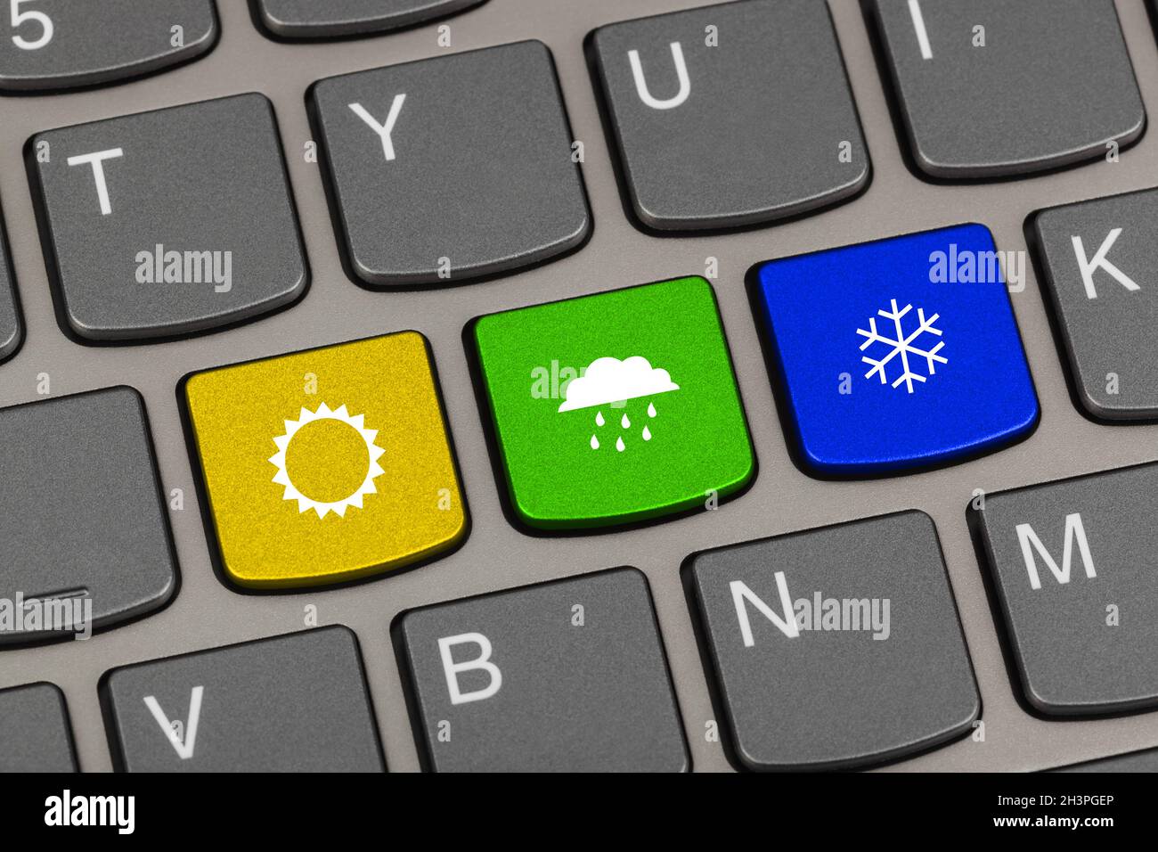 Computer keyboard with Weather key Stock Photo - Alamy