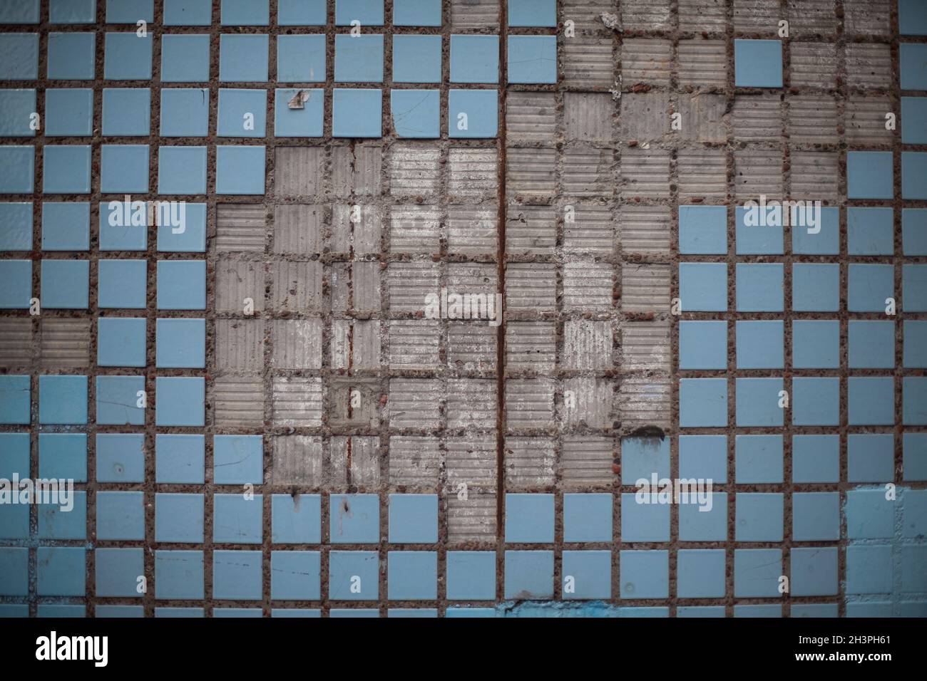 Tile texture. Fine tiles on the wall. Collapsed cladding of the ...