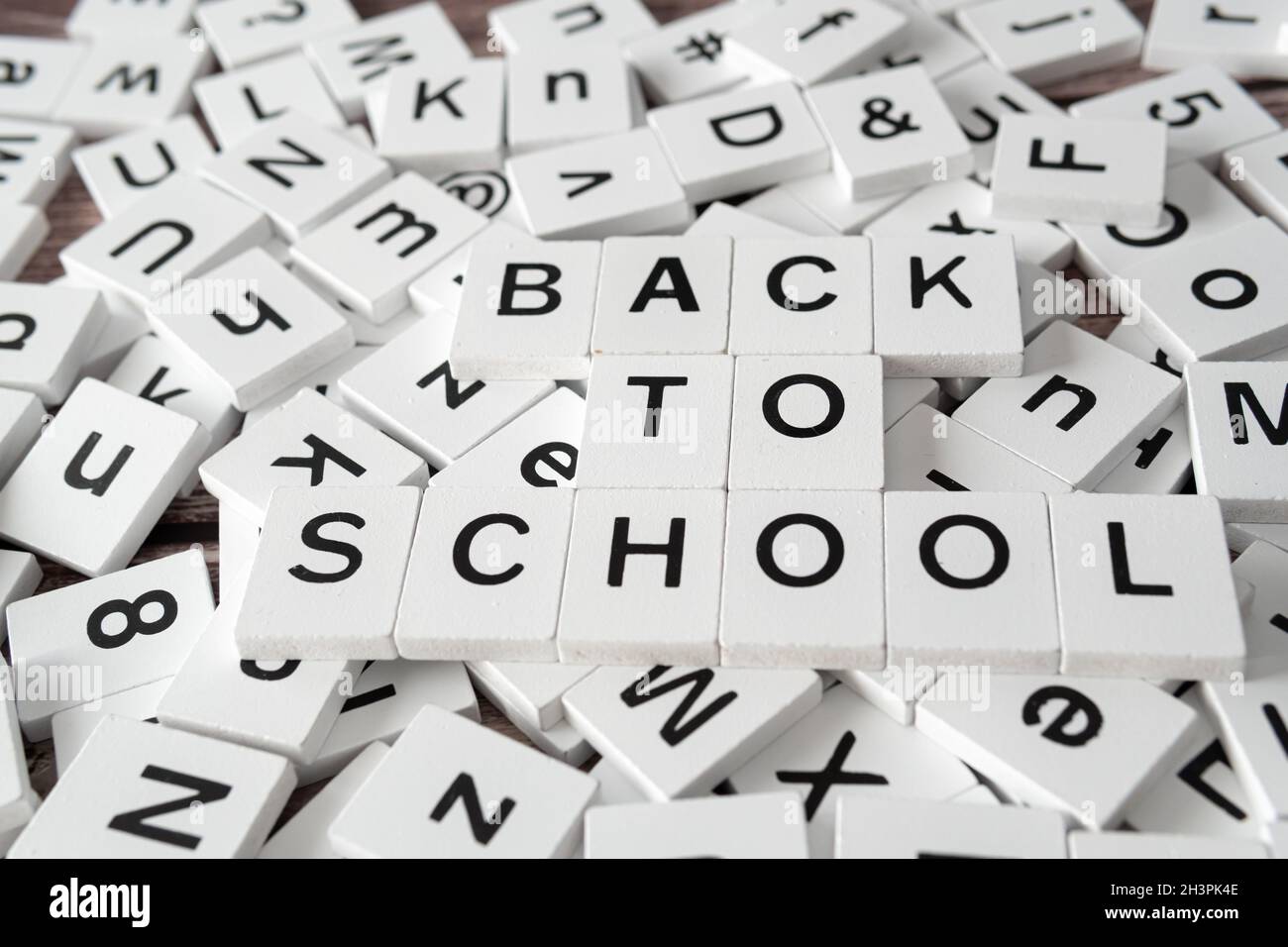 Back to School spelled with collection of letter tiles Stock Photo - Alamy