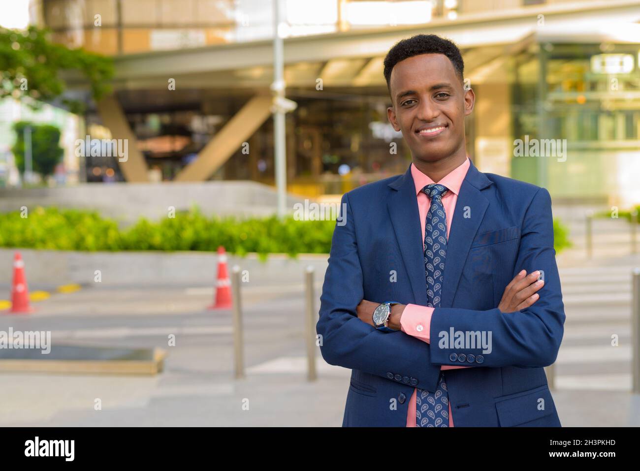 Portrait of young African businessman wearing suit and tie Stock Photo ...