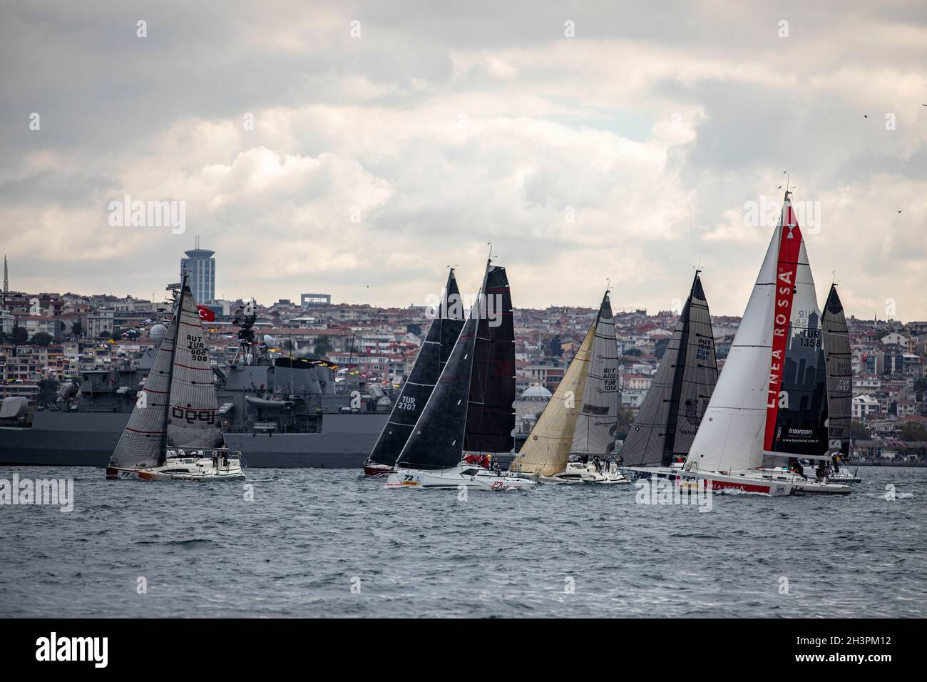 Istanbul, Turkey. 29th Oct, 2021. People compete with their sailboats ...