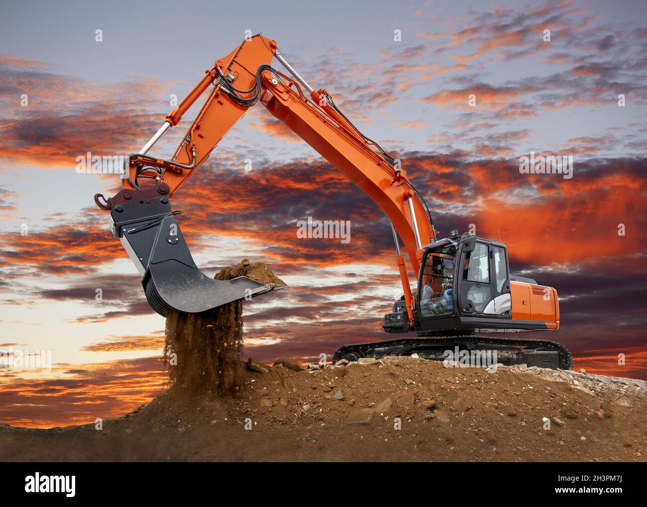 Excavator at work on construction site Stock Photo - Alamy
